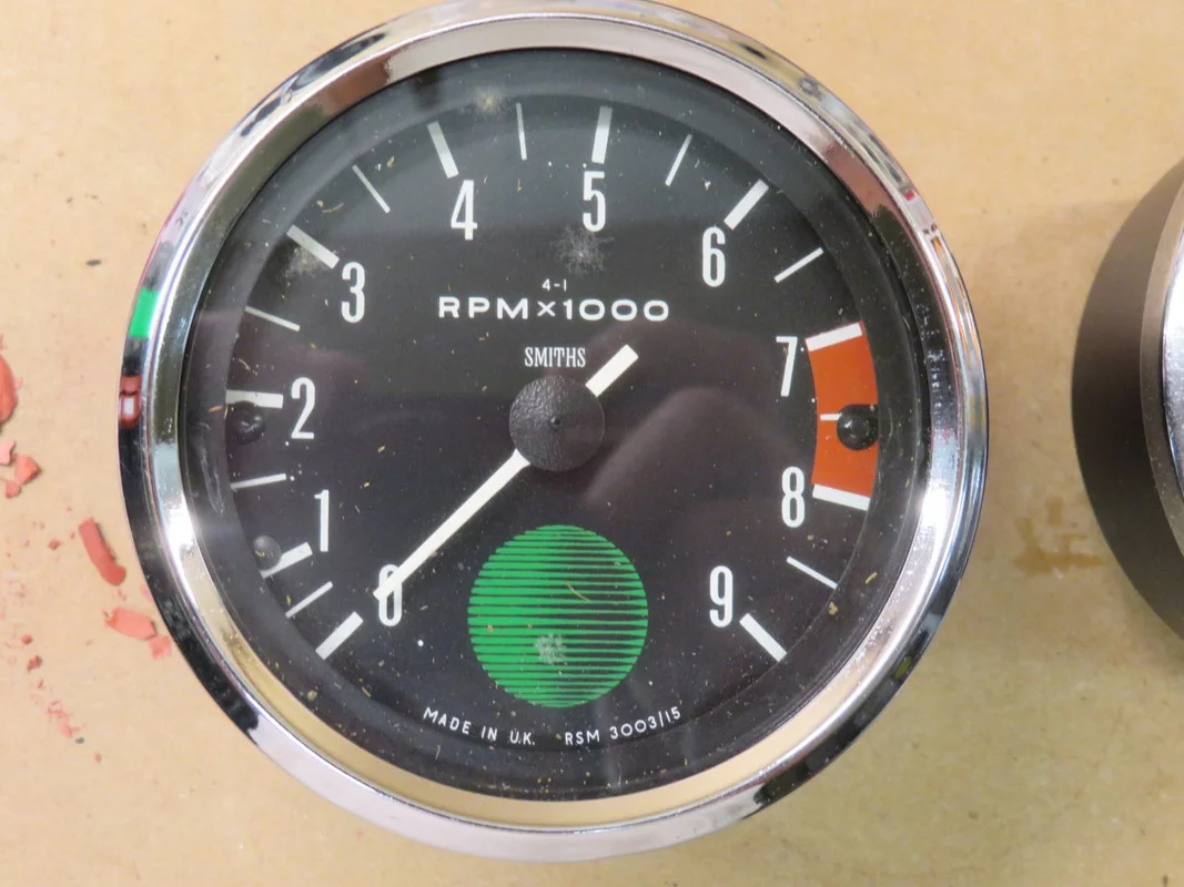 original tach faces - ??? - Norton script? | Access Norton